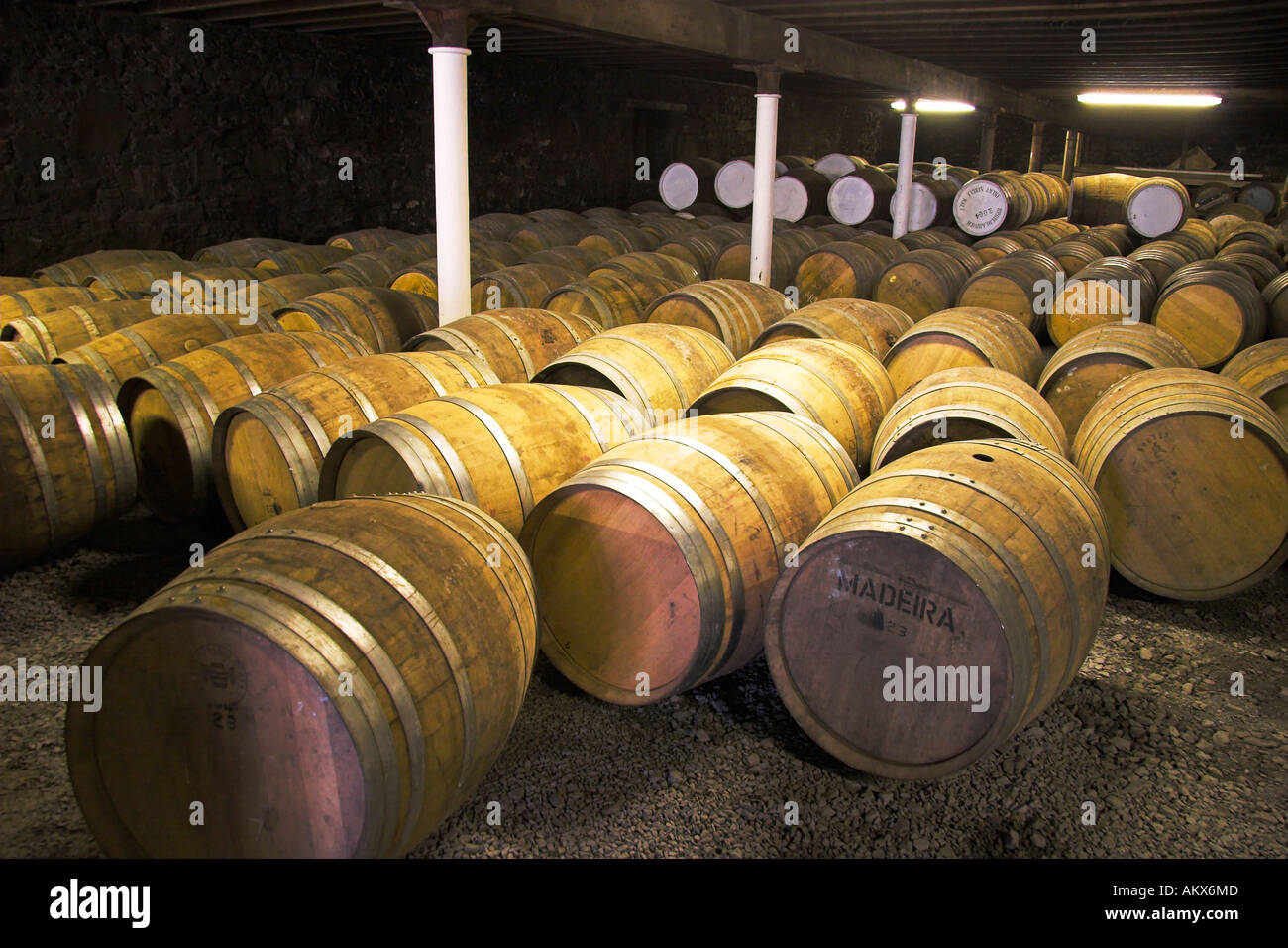 Used casks laying in the cellar of a distillery, get recycled and ...