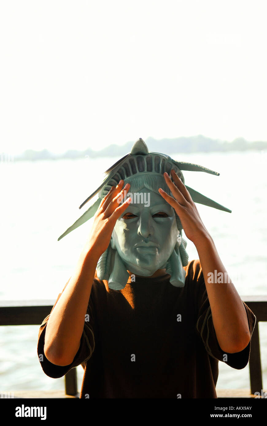 Young american boy wearing a Statue of Liberty mask Stock Photo - Alamy