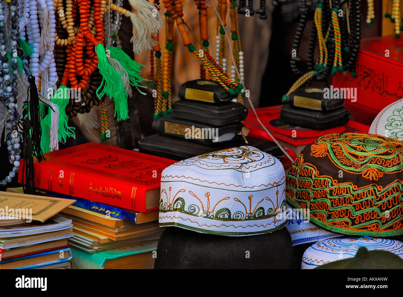 Islamic prayer books, chains and hats Stock Photo - Alamy
