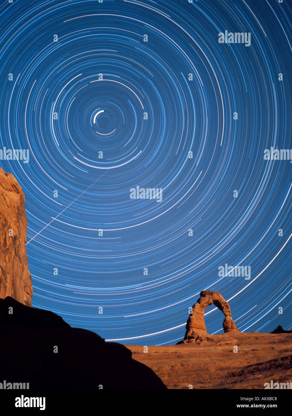 This image of Delicate Arch and the Northern sky at night shows the ...