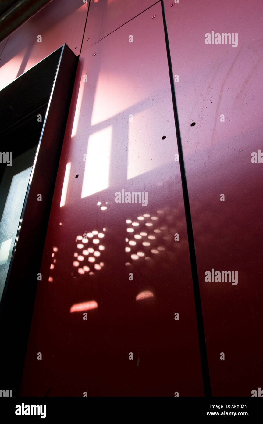Light and shadow on a wall cladding Stock Photo - Alamy