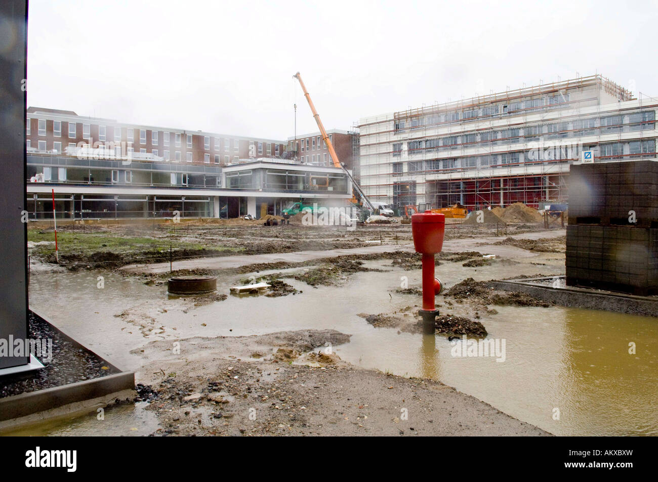 Construction site in the rain Stock Photo - Alamy