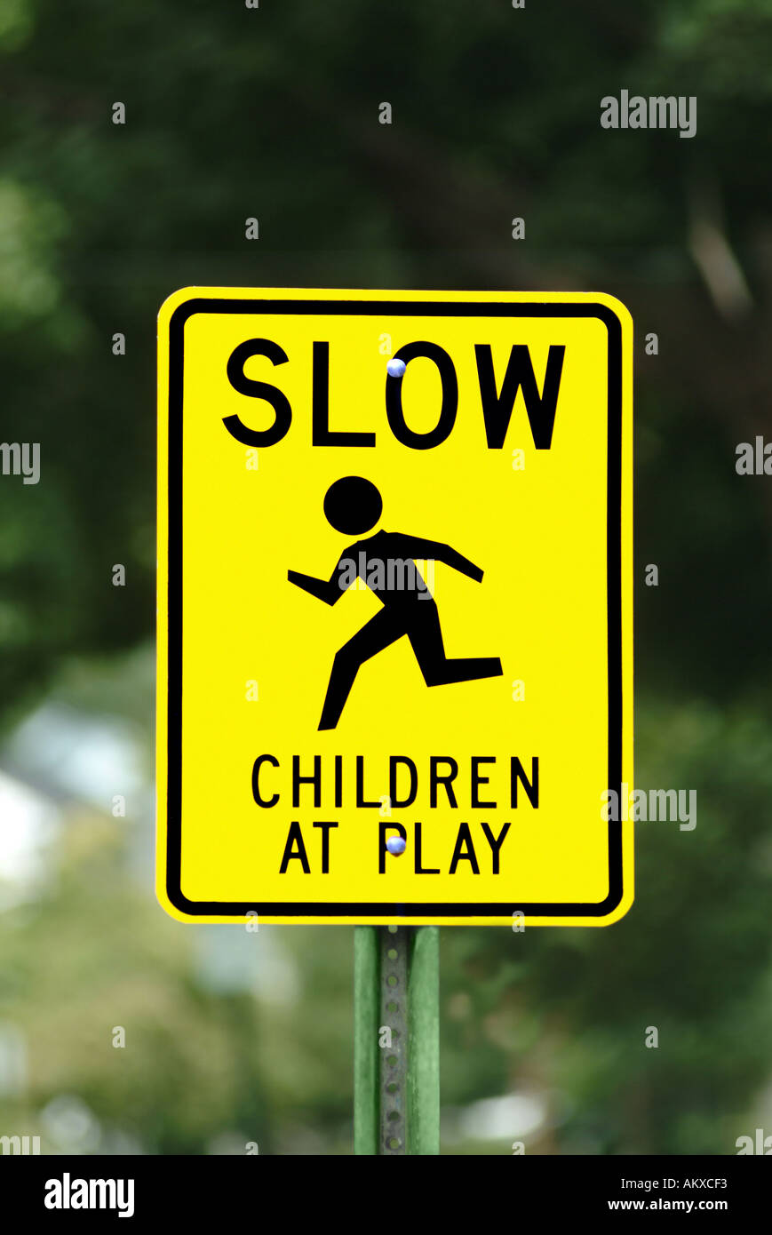 Slow children playing road sign hi-res stock photography and images - Alamy