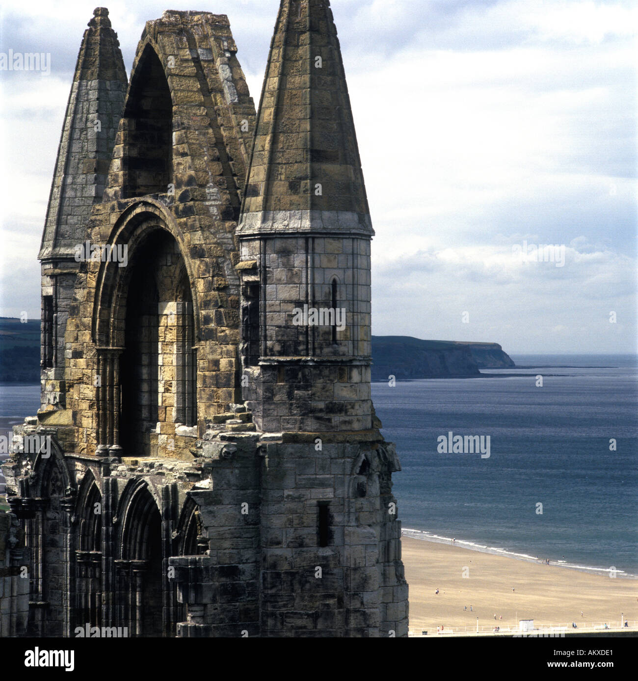 Ruined north transept gable at Whitby Abbey prominent against distant ...