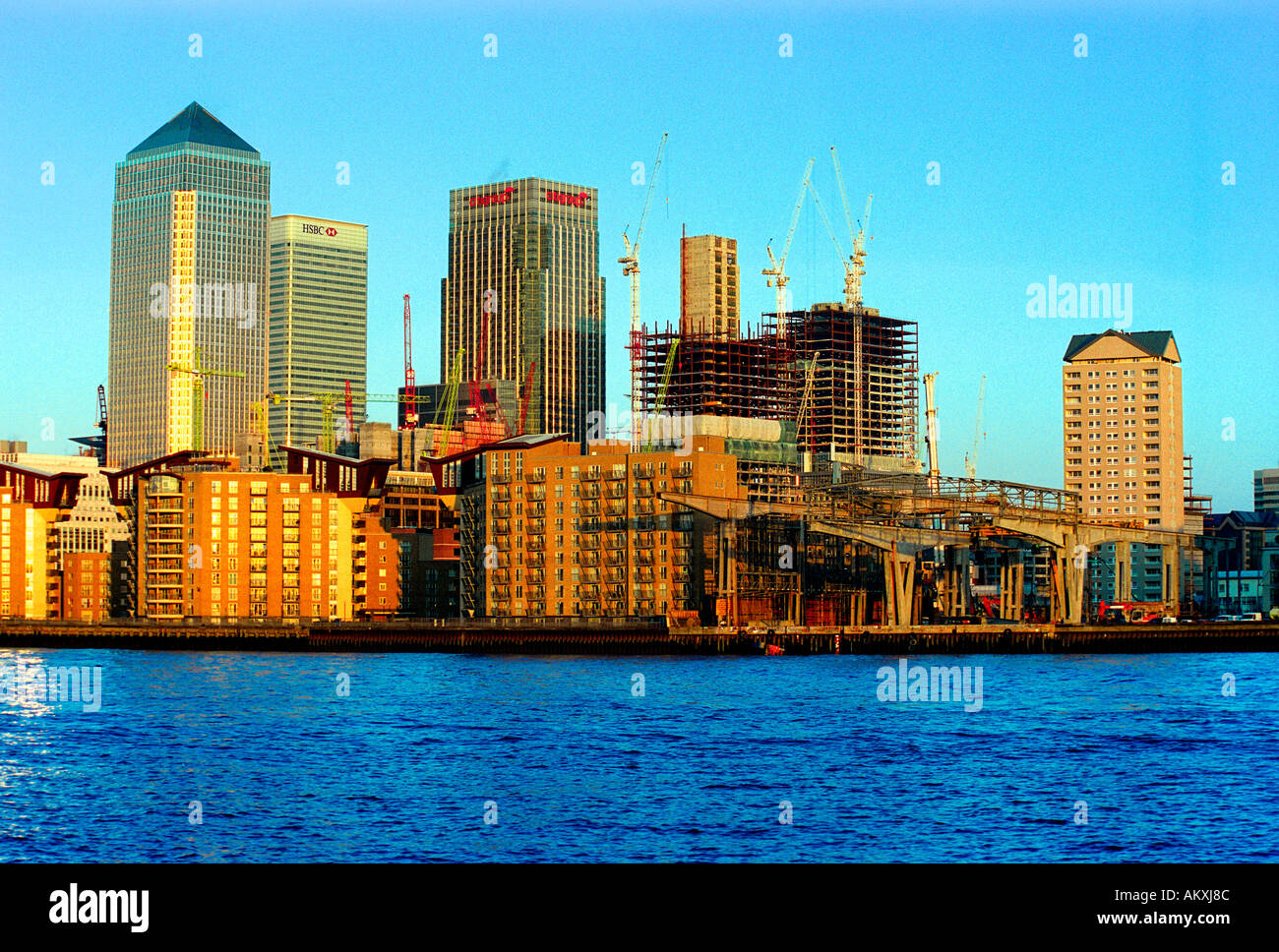 sea container with canary wharf as background backdrop sunny blue sky ...