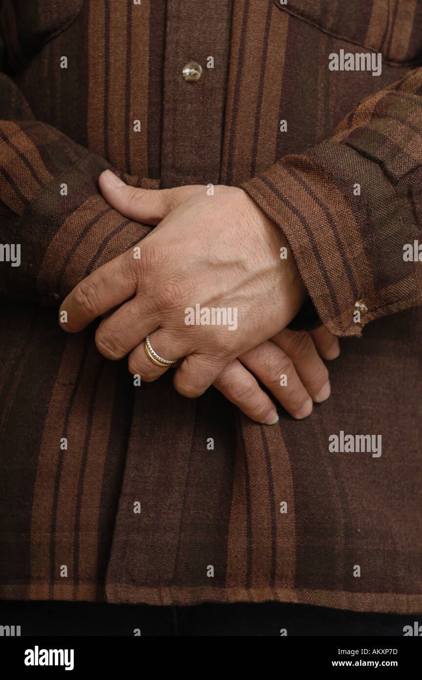 A person's folded hands Stock Photo - Alamy