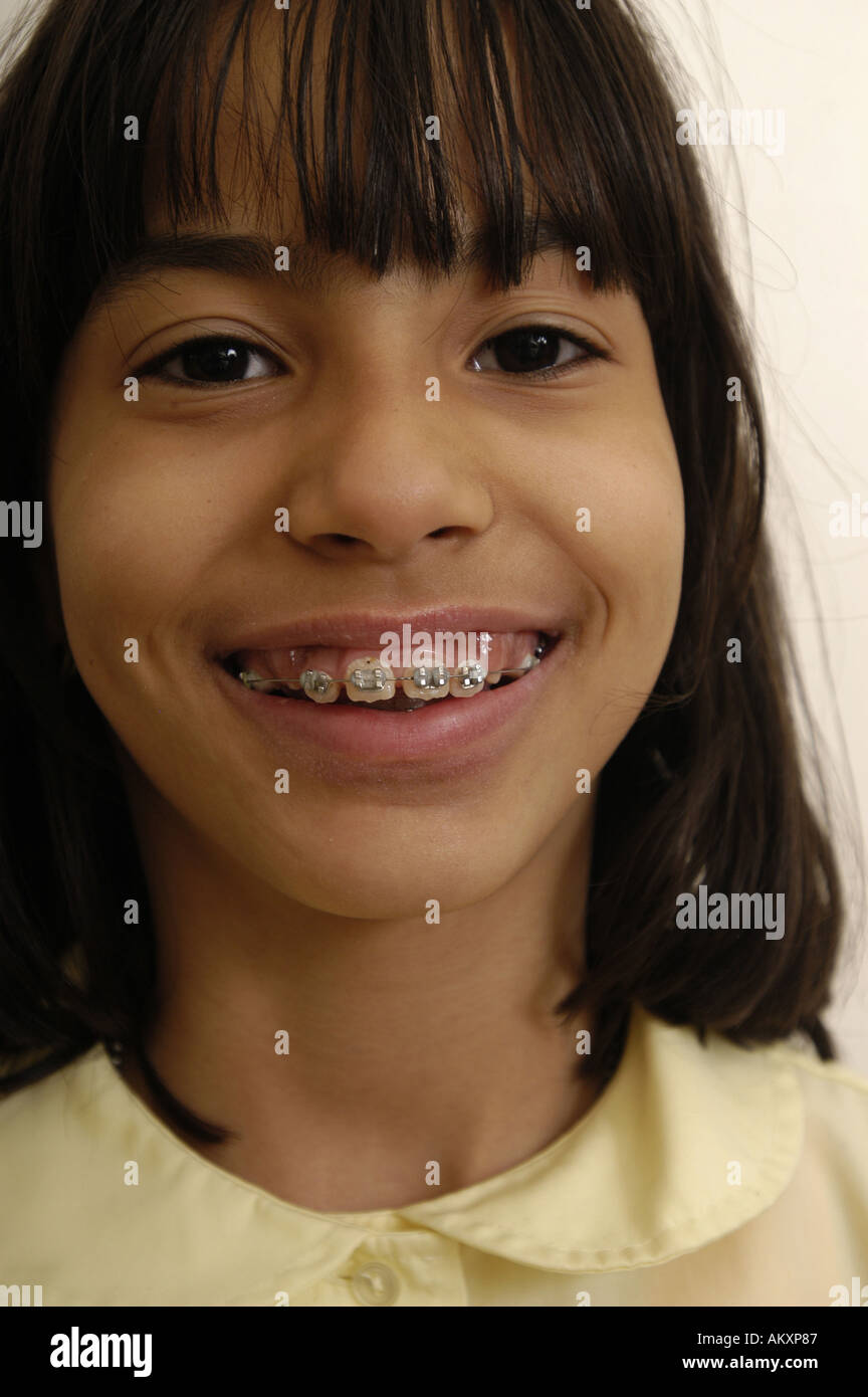 A portrait of a young, smiling Hispanic girl Stock Photo - Alamy