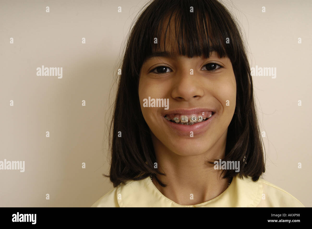 A portrait of a young, smiling Hispanic girl Stock Photo - Alamy