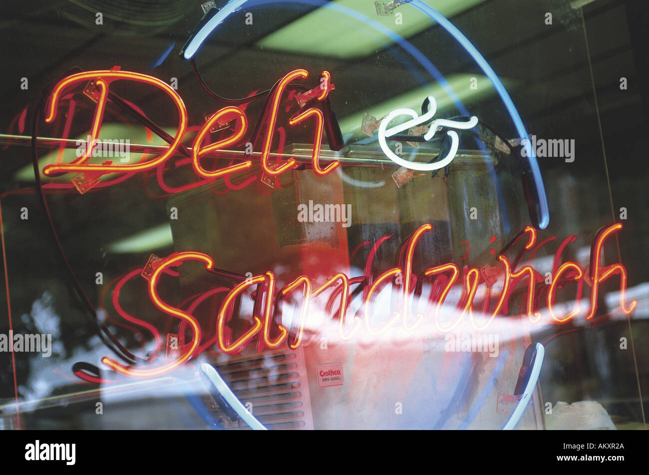 Deli sandwich neon sign on the window of a shop in New York USA Stock ...