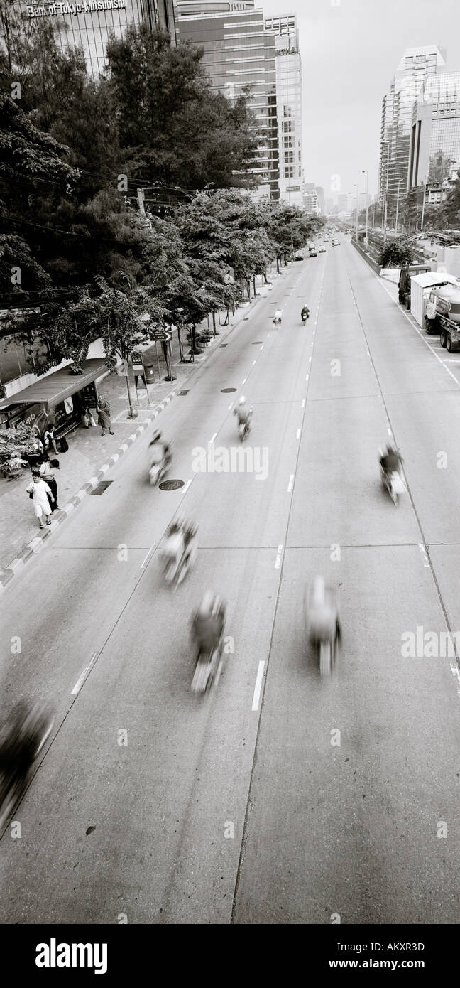 Traffic in Bangkok In Thailand in Far East Southeast Asia. Motorbike ...