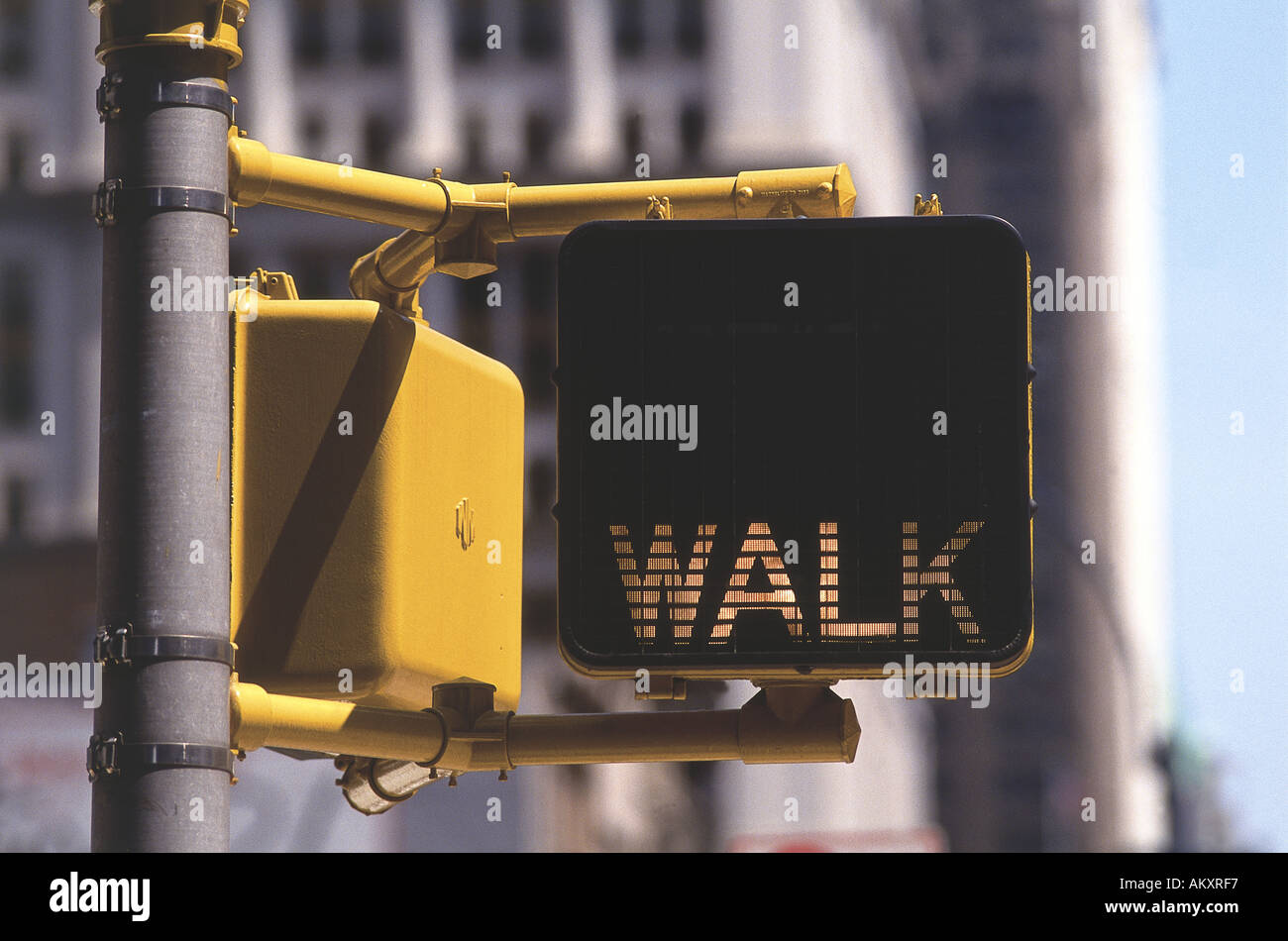 A Walk Don t Walk sign displaying the former on a sidewalk in New York ...