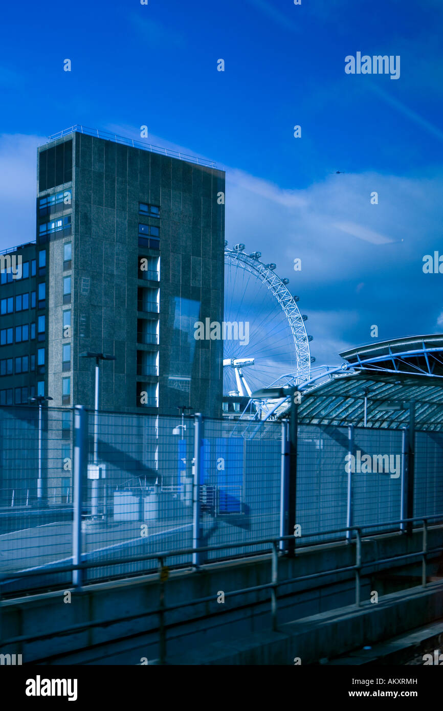 London view as seen from train window with high rise building and ...
