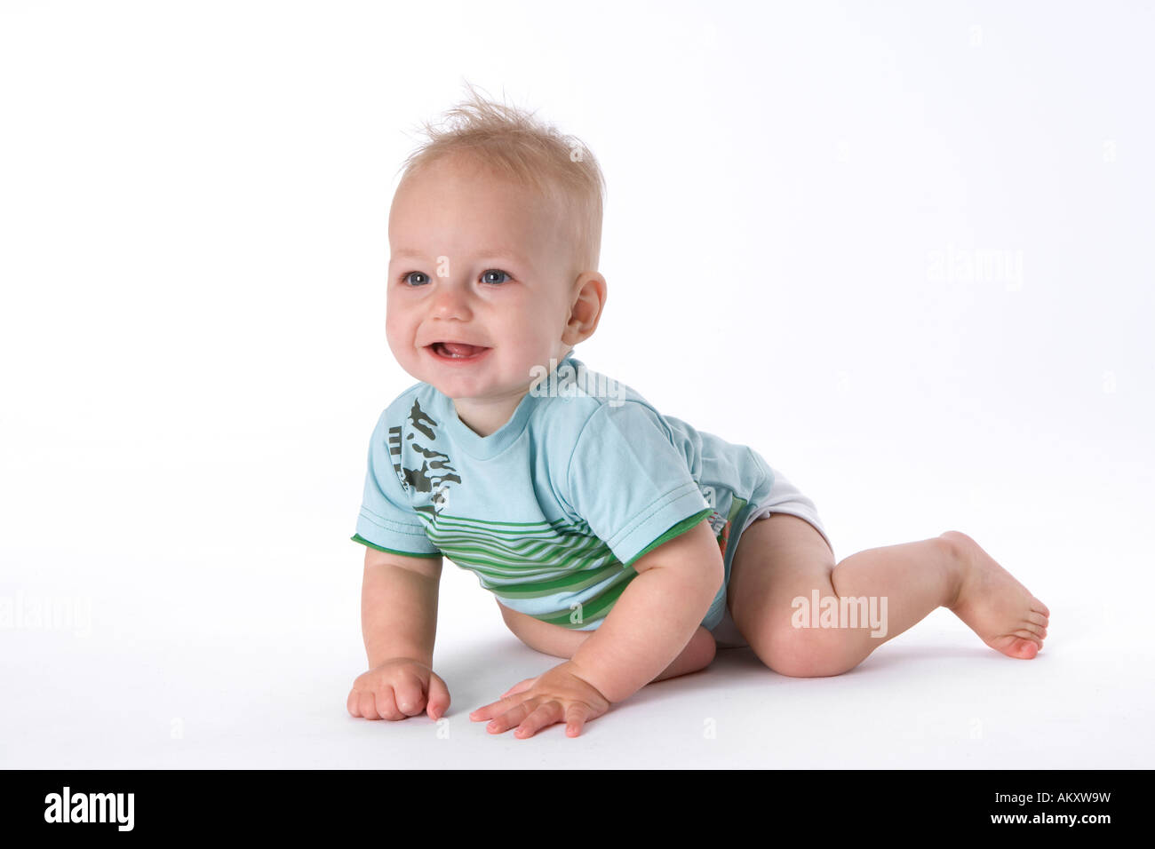 Baby boy crawling on the floor Stock Photo - Alamy