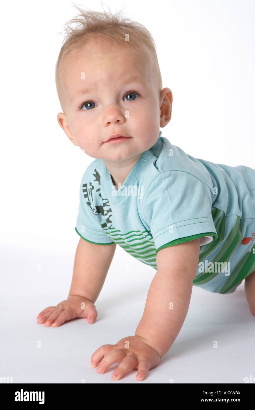 Baby boy crawling on the floor Stock Photo - Alamy