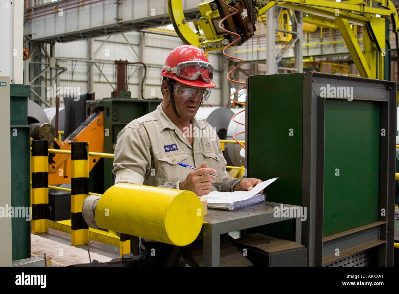 Worker at CSN factory in Curitiba Stock Photo - Alamy