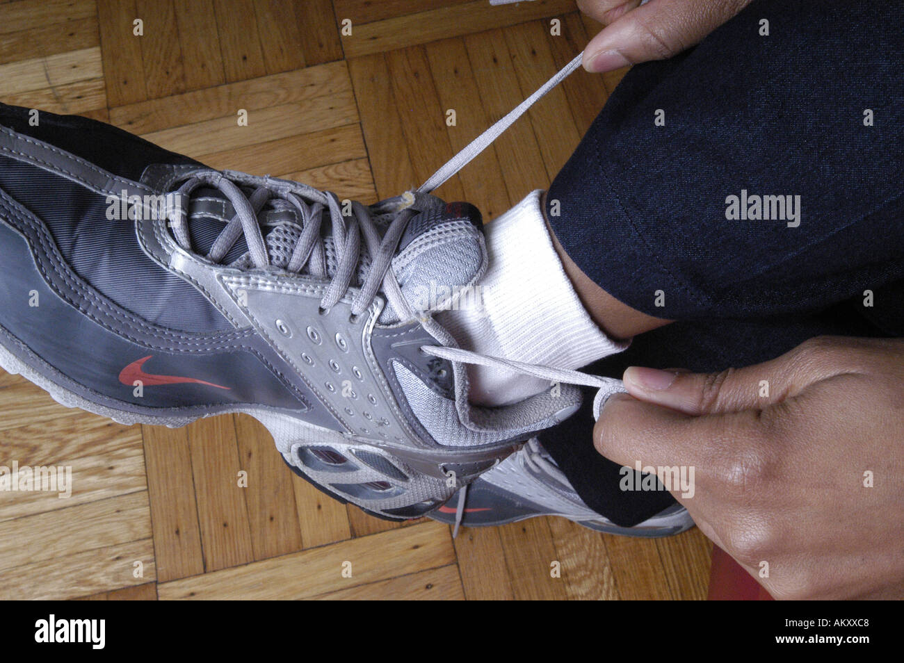 Putting on sneakers hi-res stock photography and images - Alamy