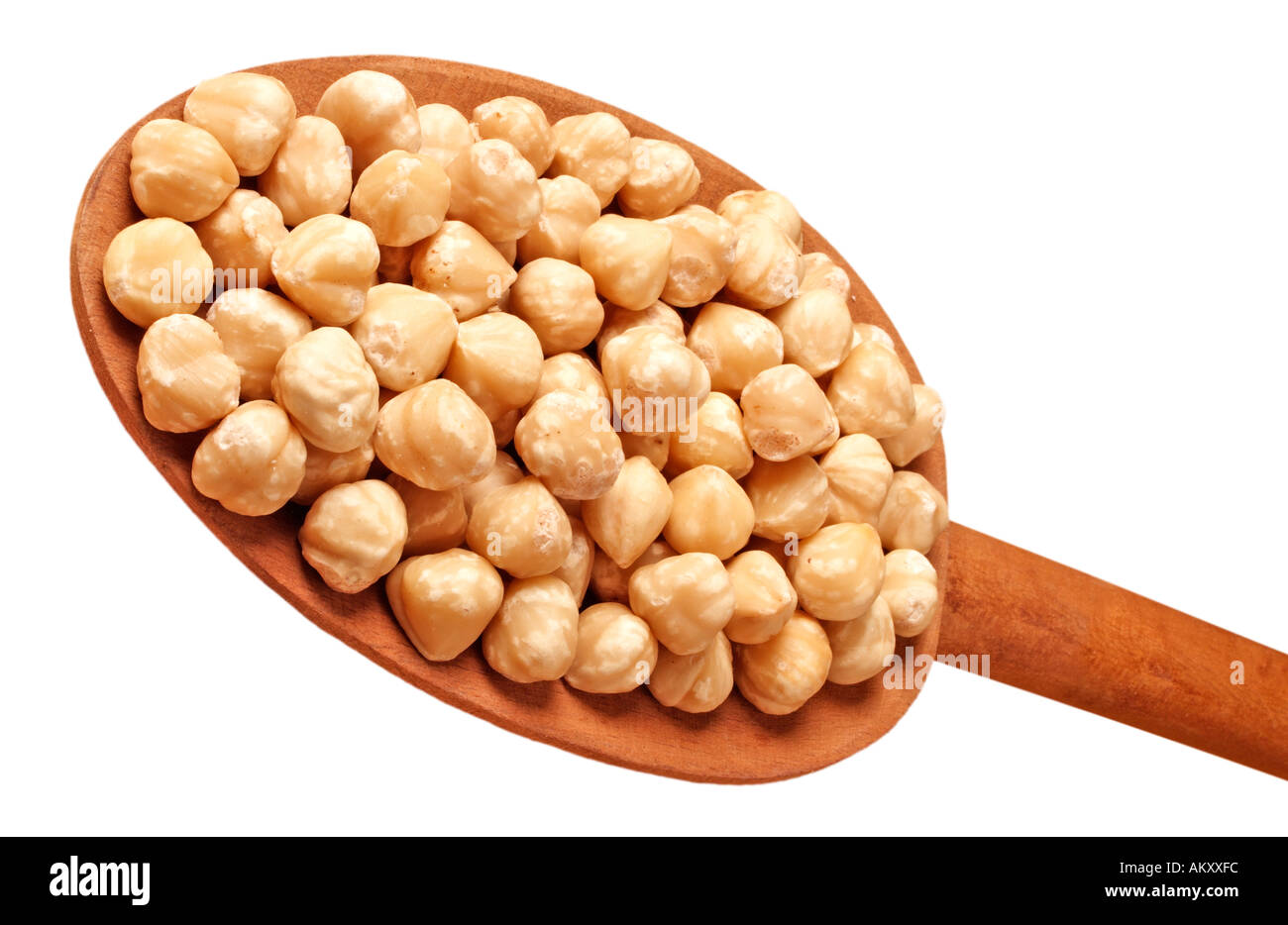 ROASTED HAZELNUTS ON SPOON CUT OUT Stock Photo - Alamy