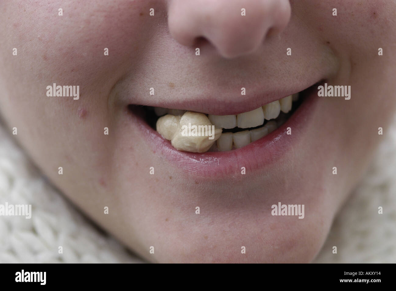 A close-up of a woman chewing bubblegum Stock Photo - Alamy