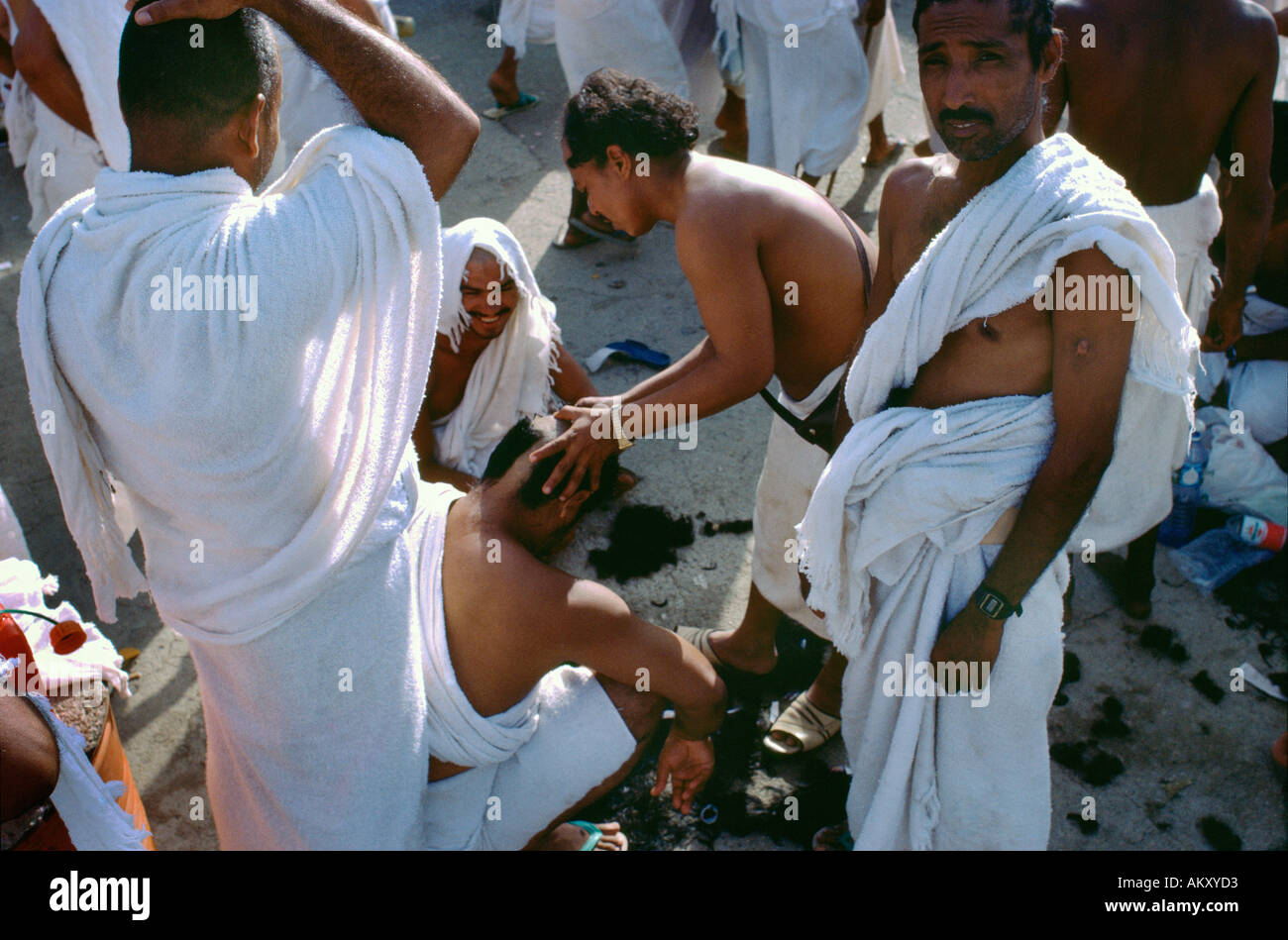 Makkah Saudi Arabia Hajj Mina Pilgrims Performing Halq (Shaving Hair ...