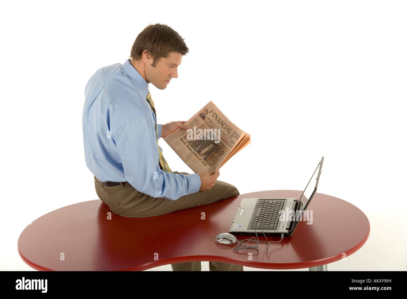 Young business man working on a laptop computer in an office ...