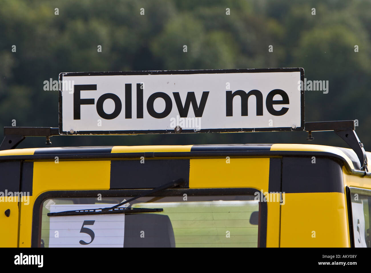 Follow me sign Stock Photo - Alamy