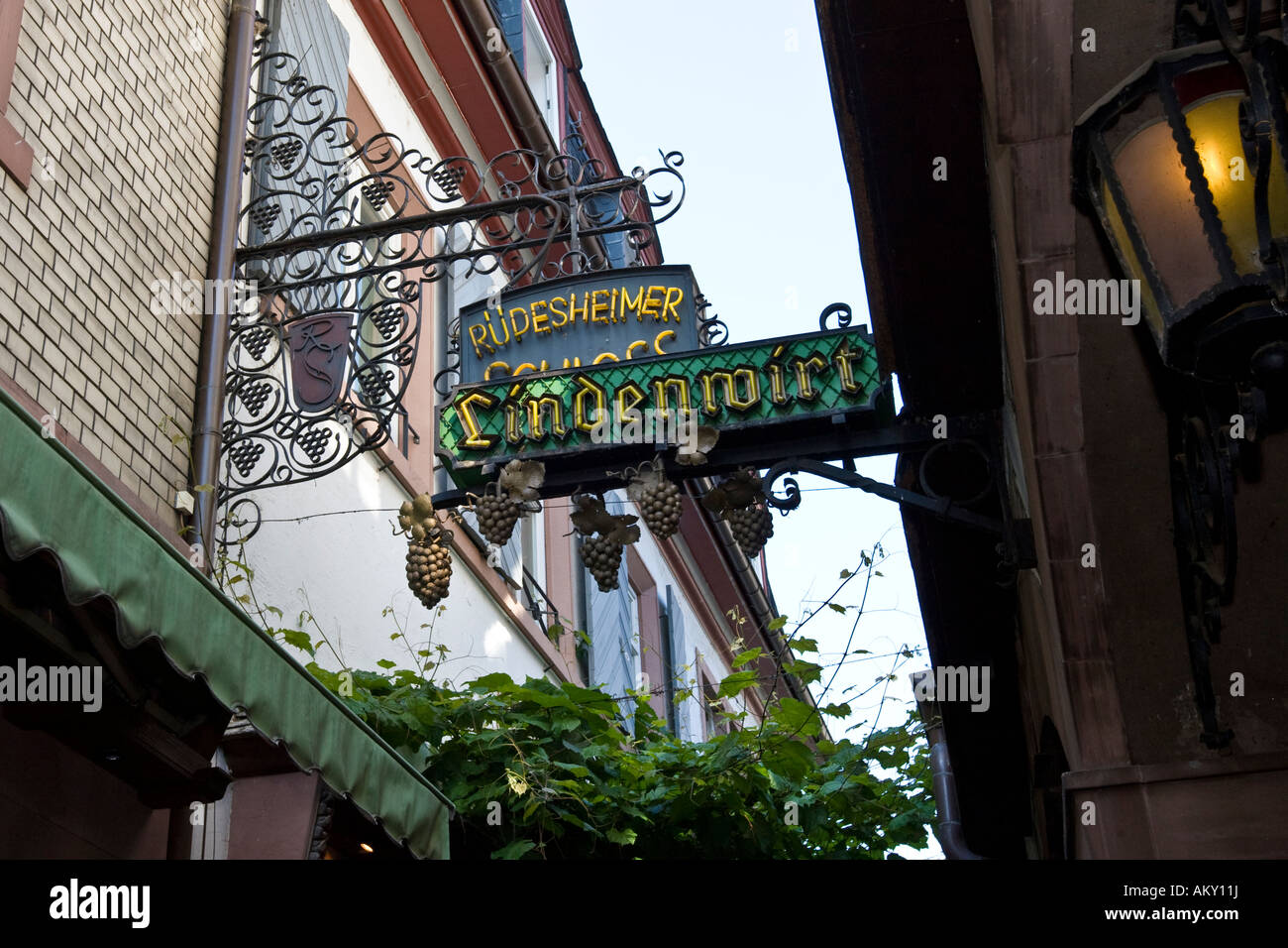 Restaurant sign in the Drossel Lane, Ruedesheim at the river Rhine ...
