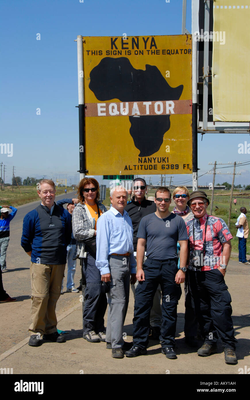 Group of tourists at the sign Equator Nanyuki Kenya Stock Photo - Alamy