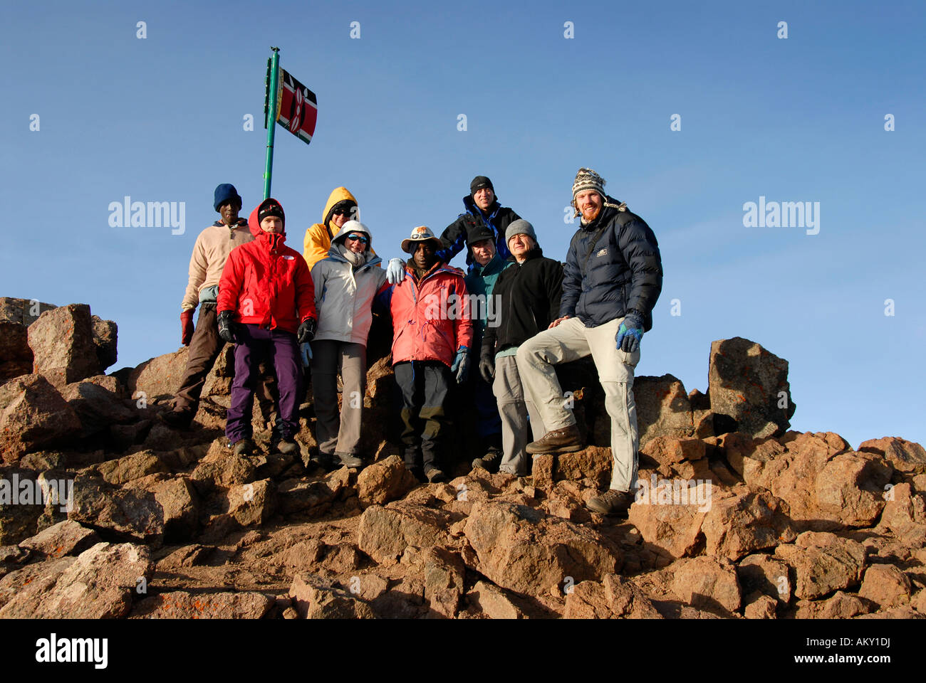 Group of mountaineerers at rocky summit Point Lenana (4985 m) Mount ...