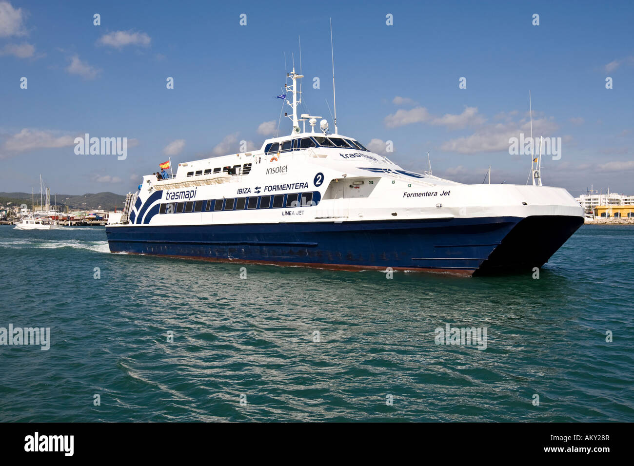 High-speed ferry between Ibiza and Formentera leaving the harbour of ...