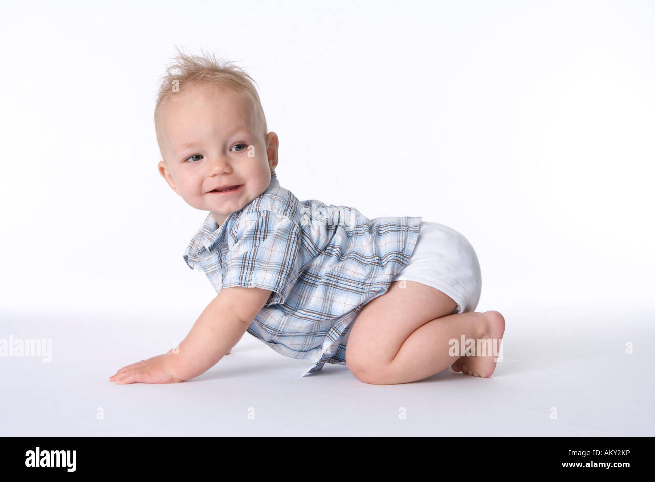 Baby boy crawling on the floor Stock Photo - Alamy