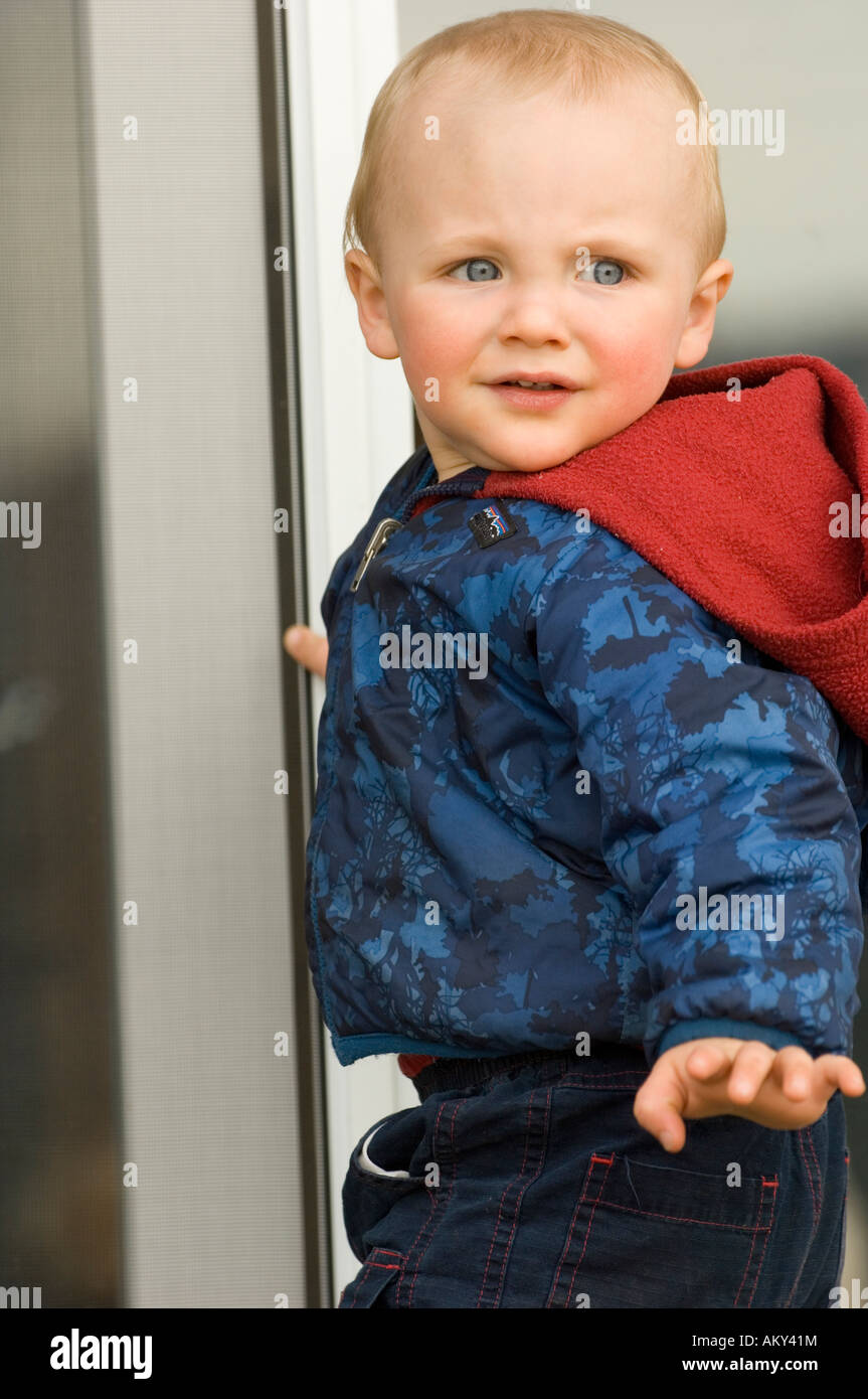 Young toddler looking back Stock Photo - Alamy