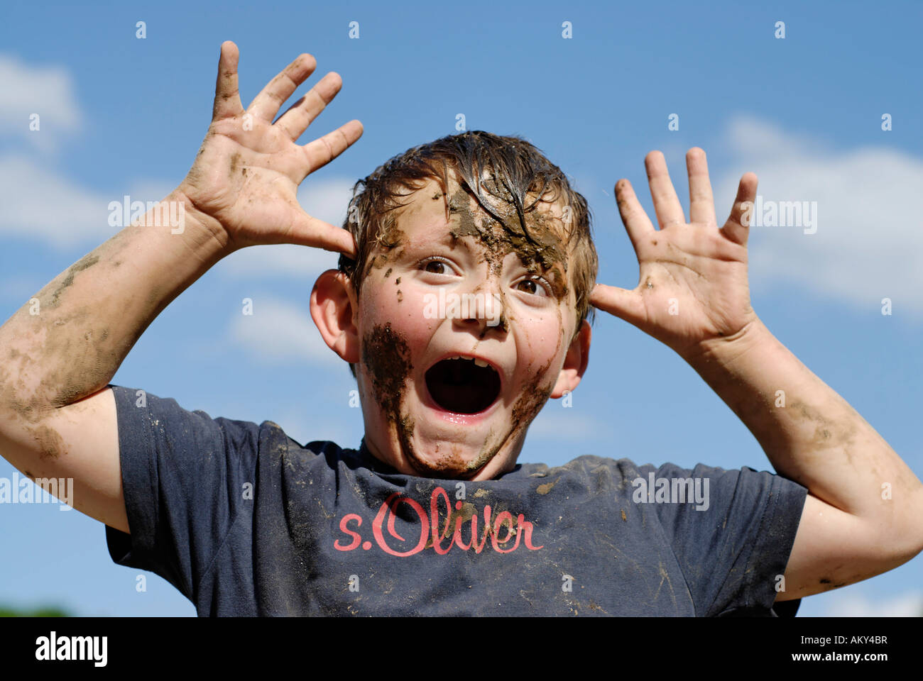 Boy covered mud hi-res stock photography and images - Alamy