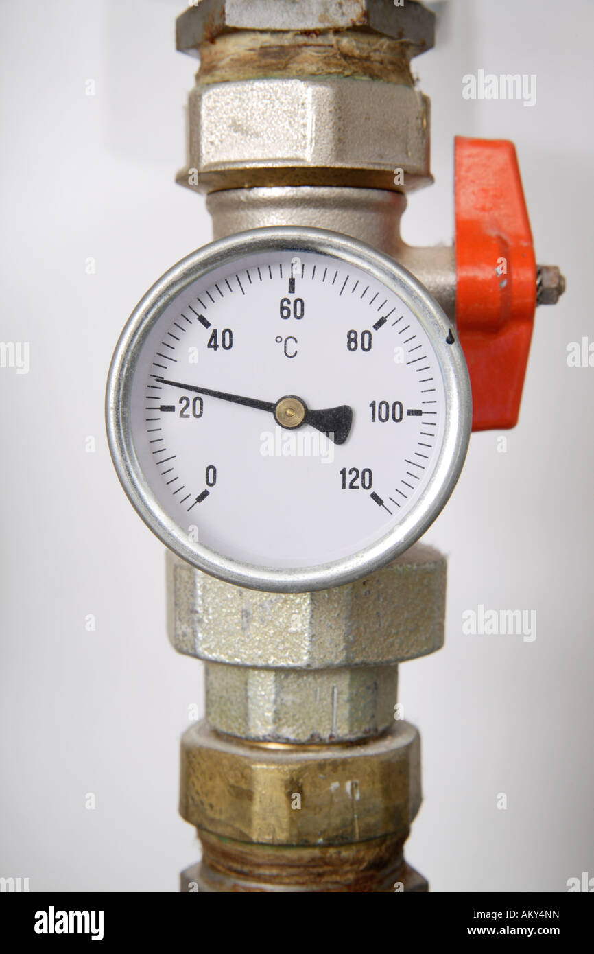 Thermometer on pipeline, close-up Stock Photo - Alamy