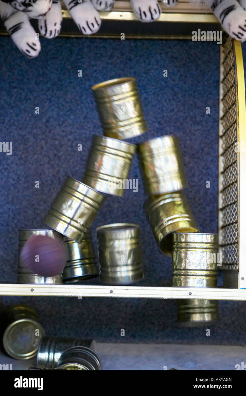 Throwing ball at cans hi-res stock photography and images - Alamy