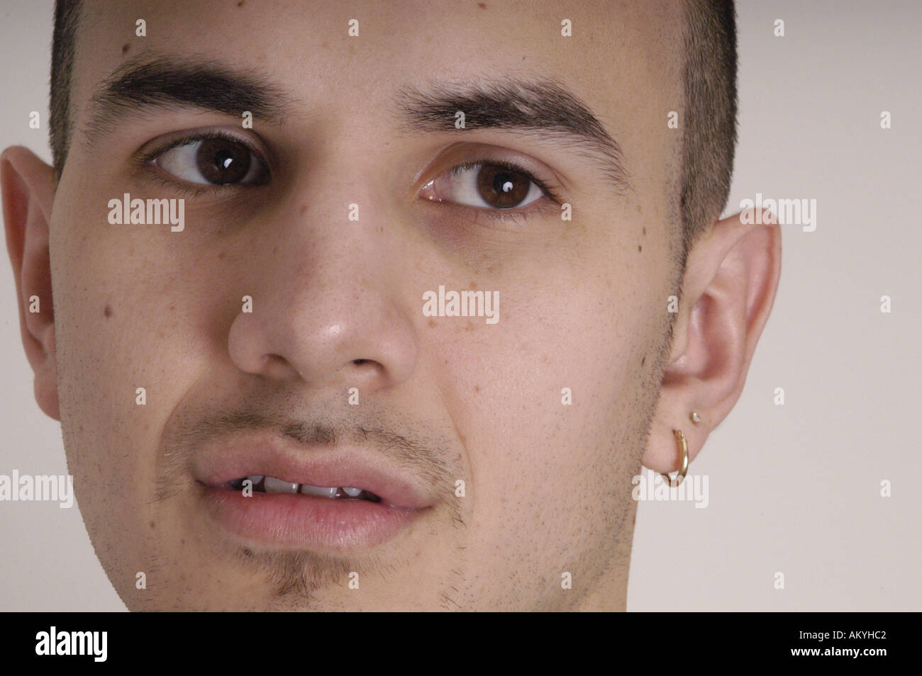 A portrait of a young Hispanic male Stock Photo - Alamy