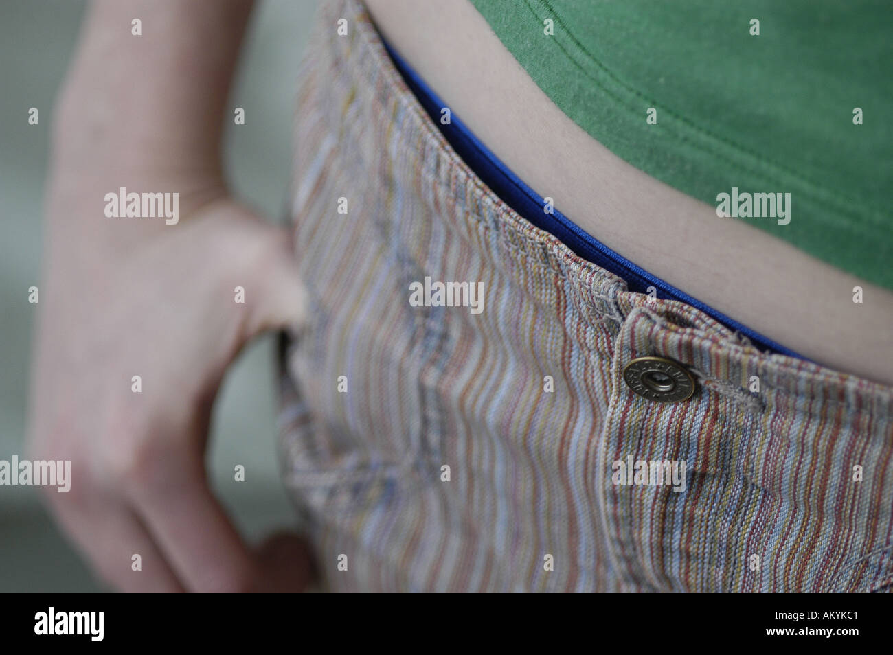 trousers pants fly zip zipper button belly midriff stomach woman lady ...