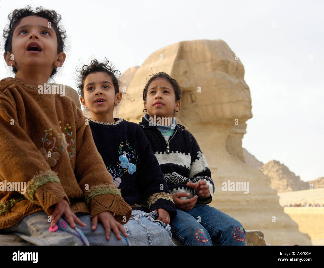 The pyramids in Gizeh. Three Children in front of the Sphinx, Gizeh ...