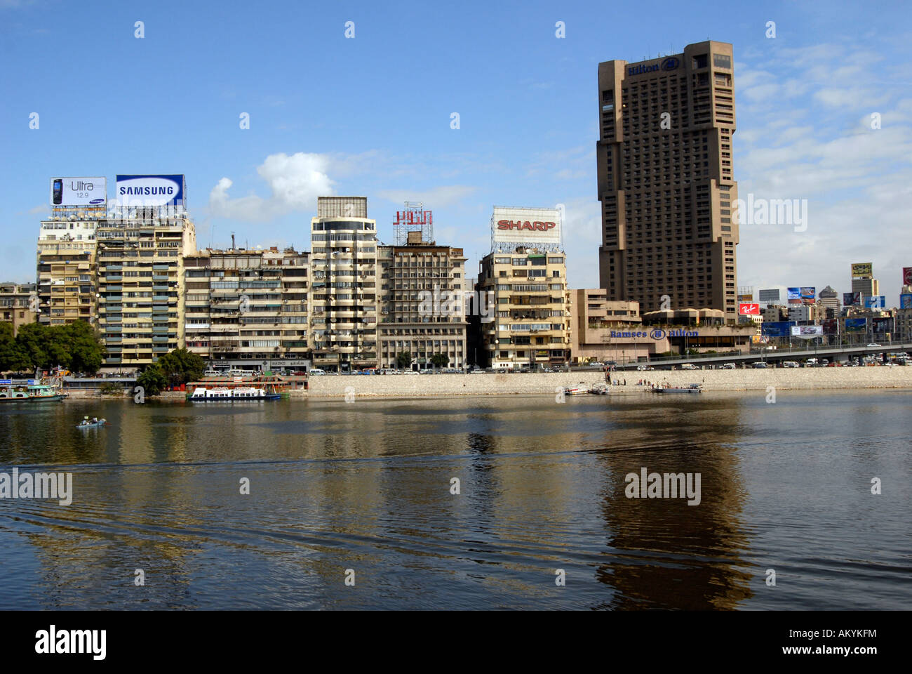 Cairo - Nile with modern multistoried buildings and advertising, Cairo ...