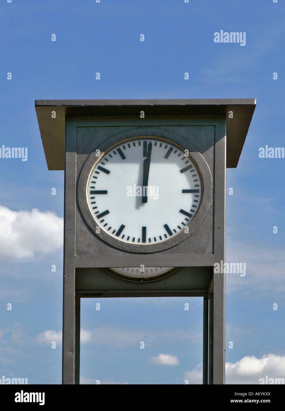 Clock showing 12 noon Stock Photo - Alamy