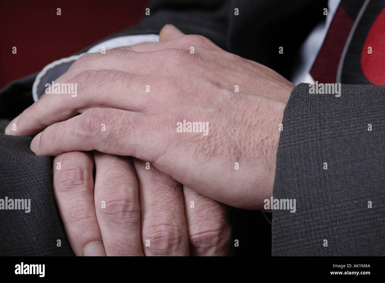 Hands crossed in lap hi-res stock photography and images - Alamy