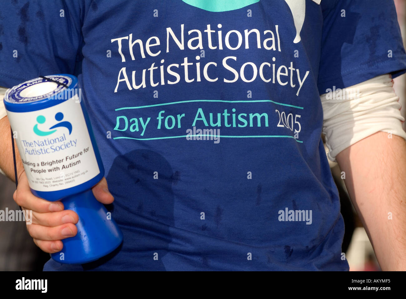 National Autistic Society volunteer collecting monies on Day for Autism ...