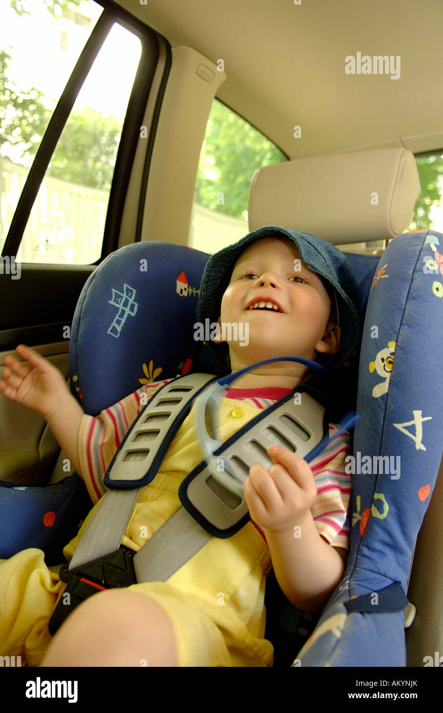 Child is sitting in a car Stock Photo - Alamy
