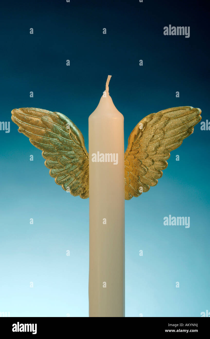 Candle and angle´s wings Stock Photo - Alamy