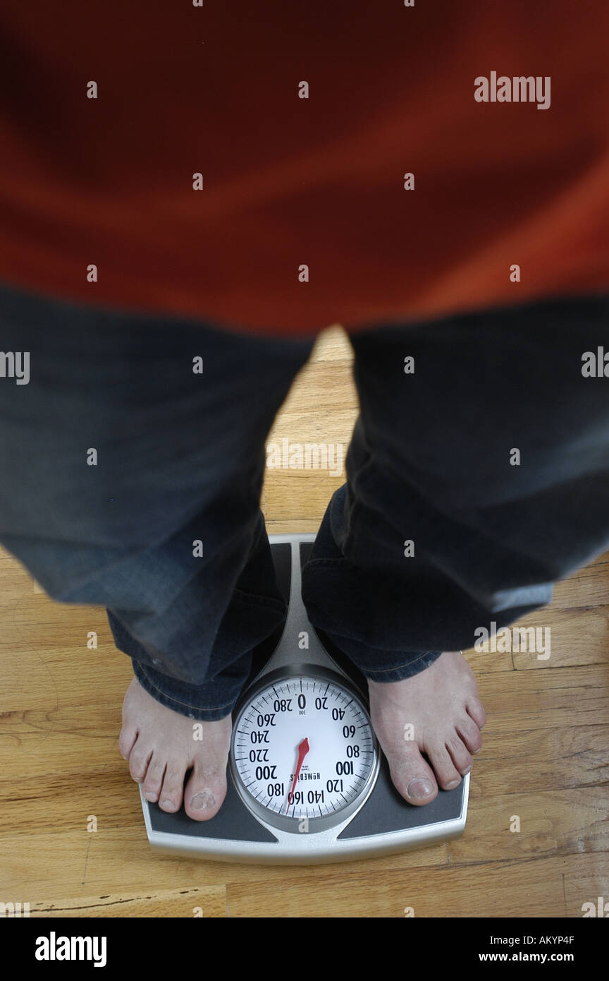 man male weigh weighing scales scales slim obese overweight light heavy ...