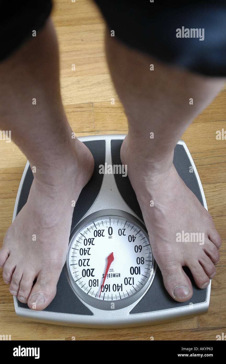 man male weigh weighing scales scales slim obese overweight light heavy ...