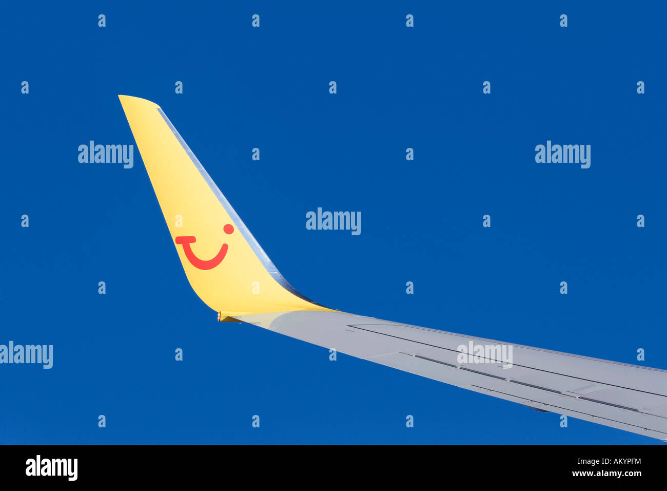 The wing of a Boing 737 with the TUI logo Stock Photo - Alamy