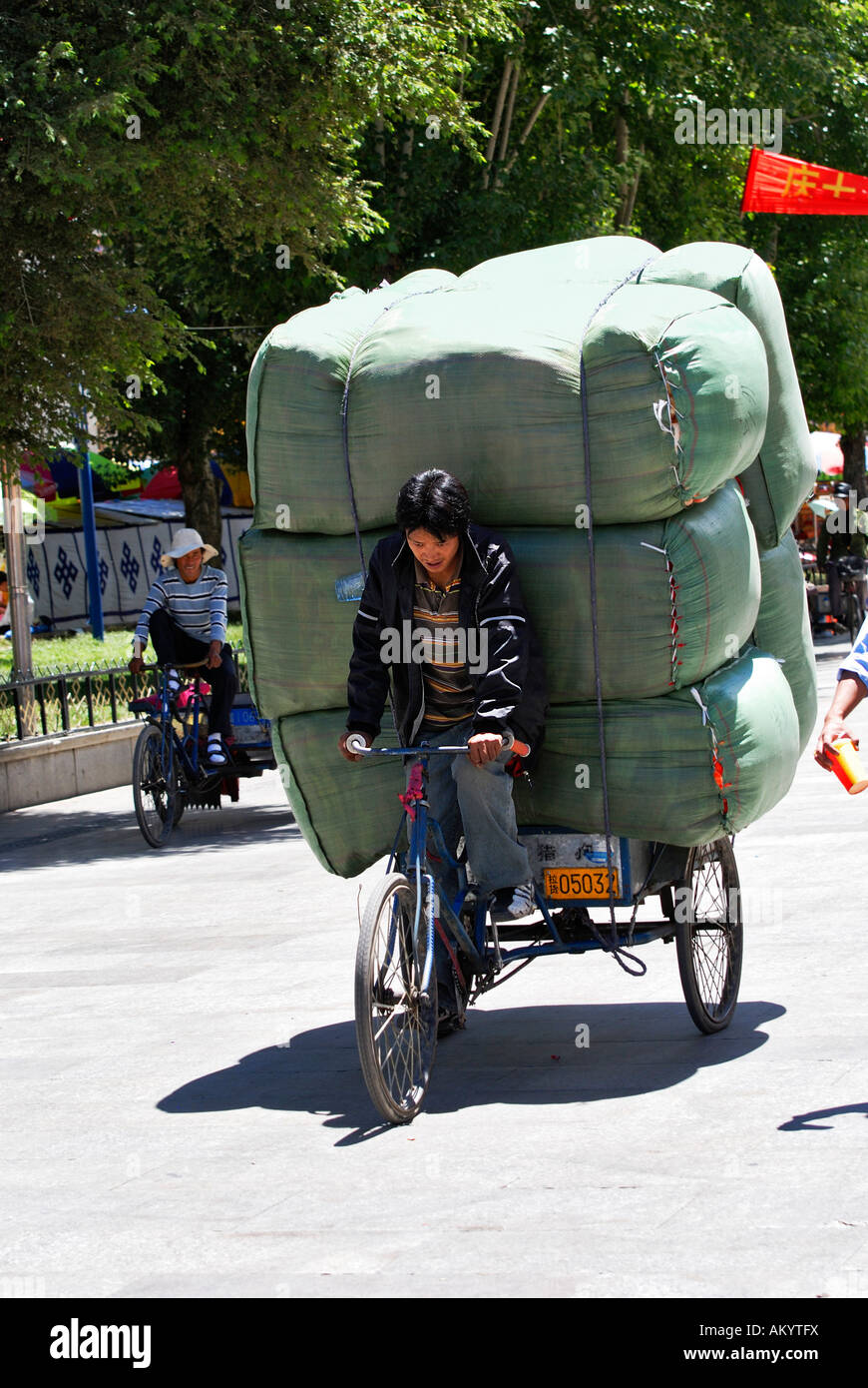 Cycle rickshaw with giant load, Lhasa, Tibet, Asia Stock Photo - Alamy