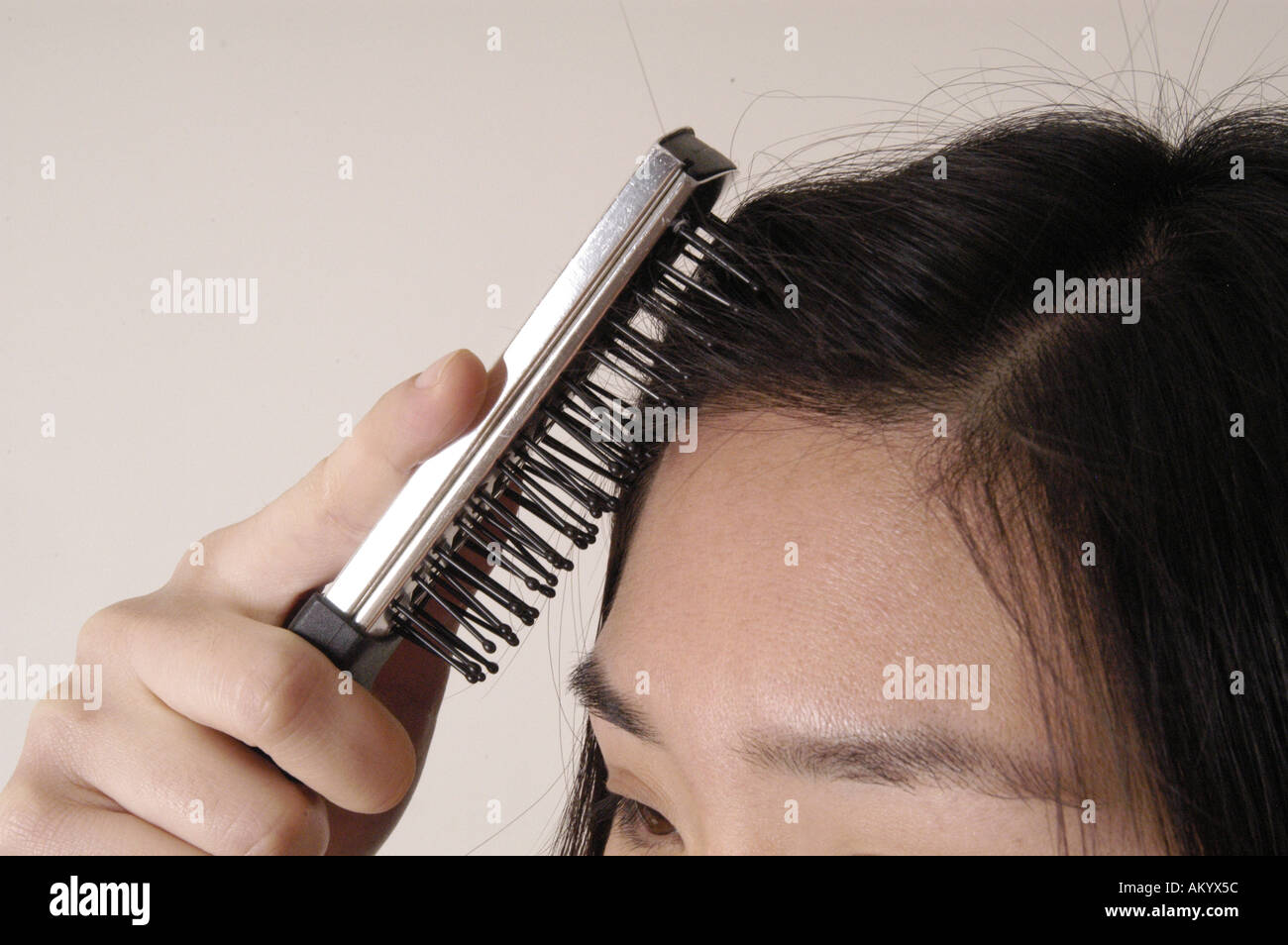 Stylist parting hair hi-res stock photography and images - Alamy