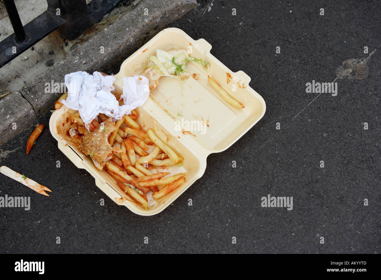 Discarded take away food in a street Stock Photo - Alamy