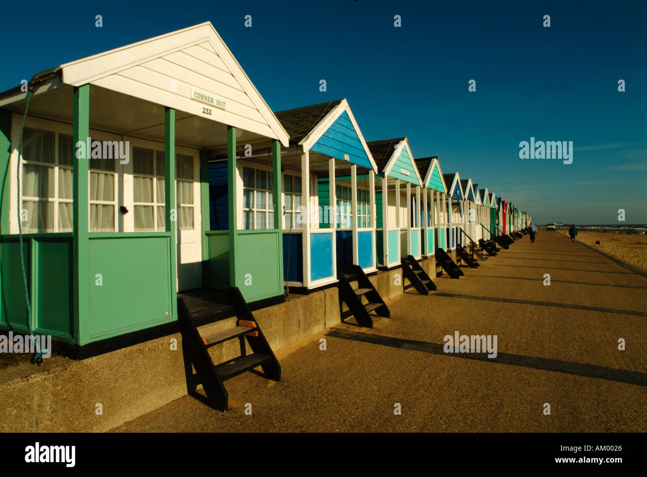Brightly-painted beach huts Stock Photo - Alamy